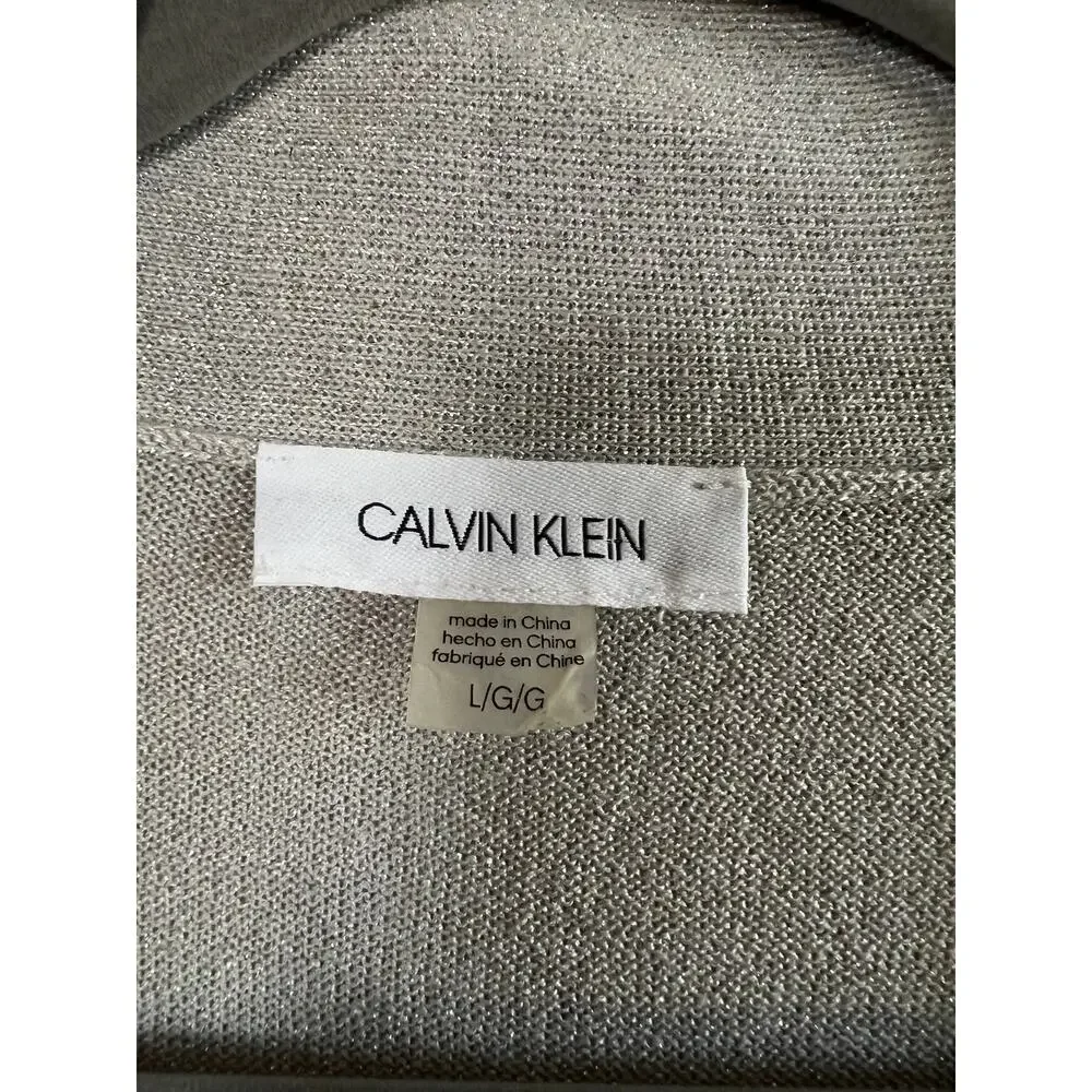 Calvin Klein | Sweaters | Calvin Klein Silver Metallic Shrug Bolero ...